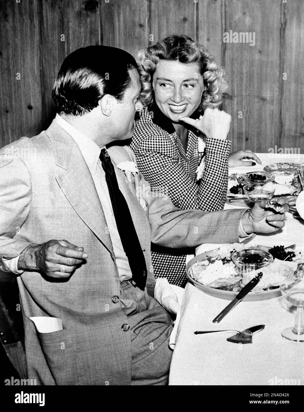 Actress Joan Blondell and producer Michael Todd have a wedding supper ...