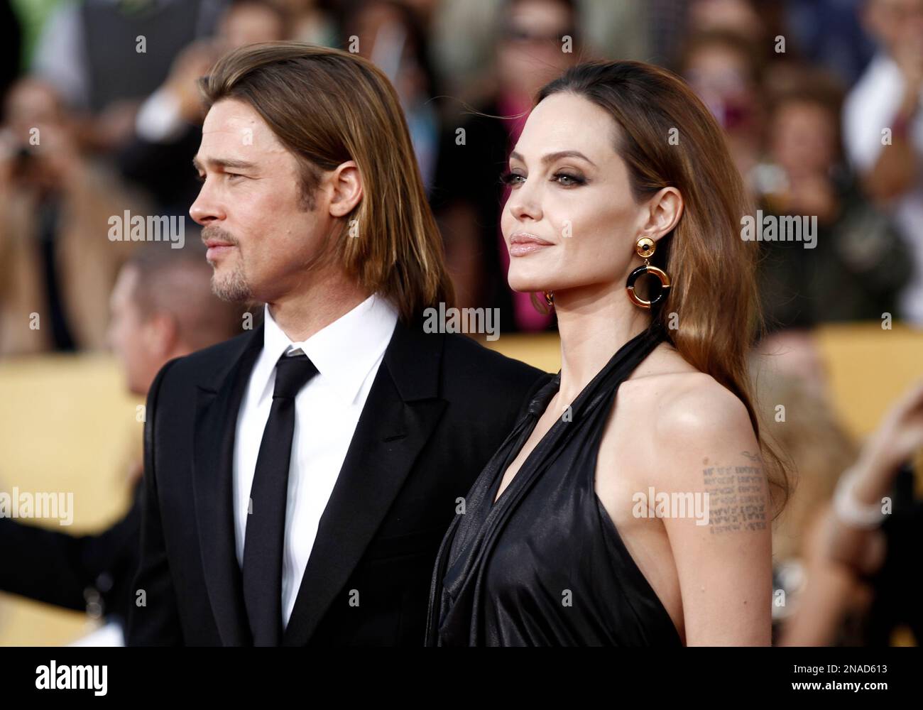 Angelina Jolie, right, and Brad Pitt arrive at the 18th Annual Screen ...