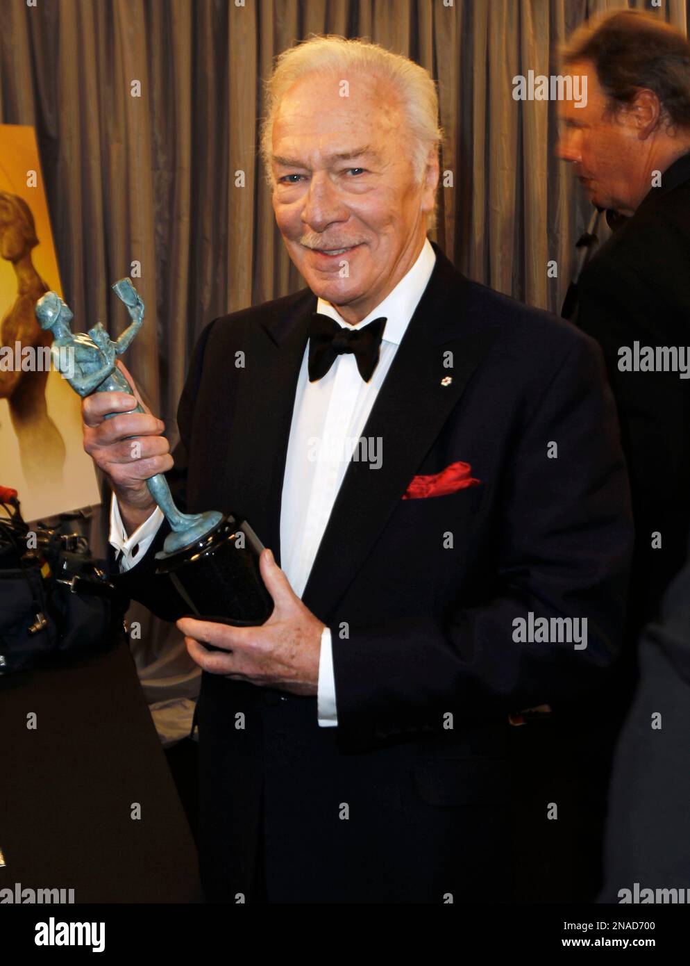 Christopher Plummer is seen backstage with the award for outstanding ...