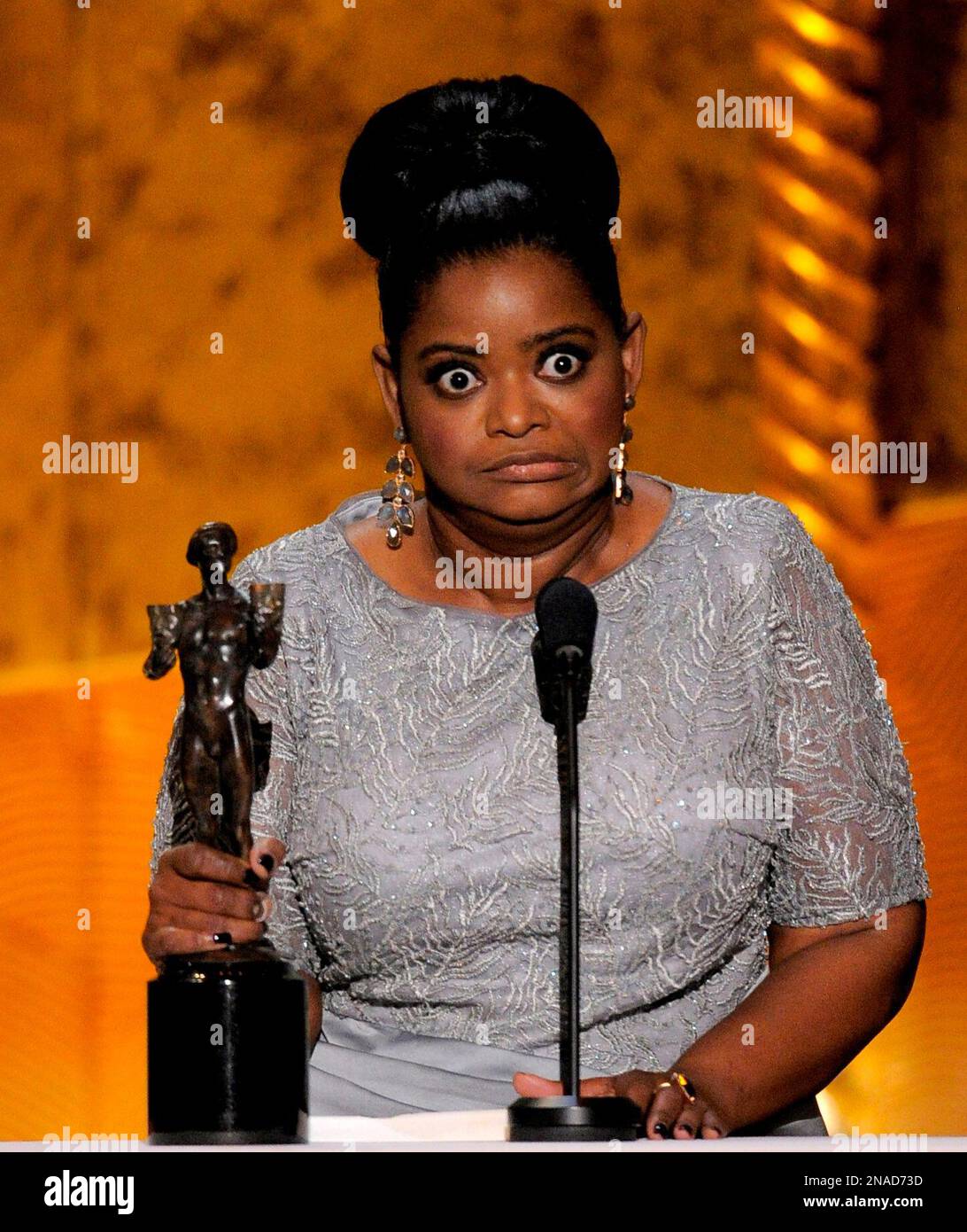 Octavia Spencer accepts the award for outstanding performance by a ...