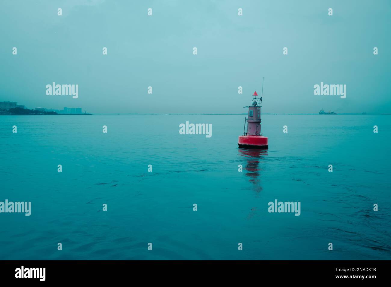 The red beacon floating in the sea with the sky and the horizon in the ...