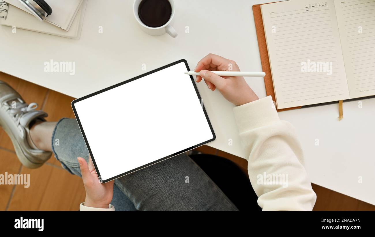 A female graphic designer designing her graphic artwork on digital ...