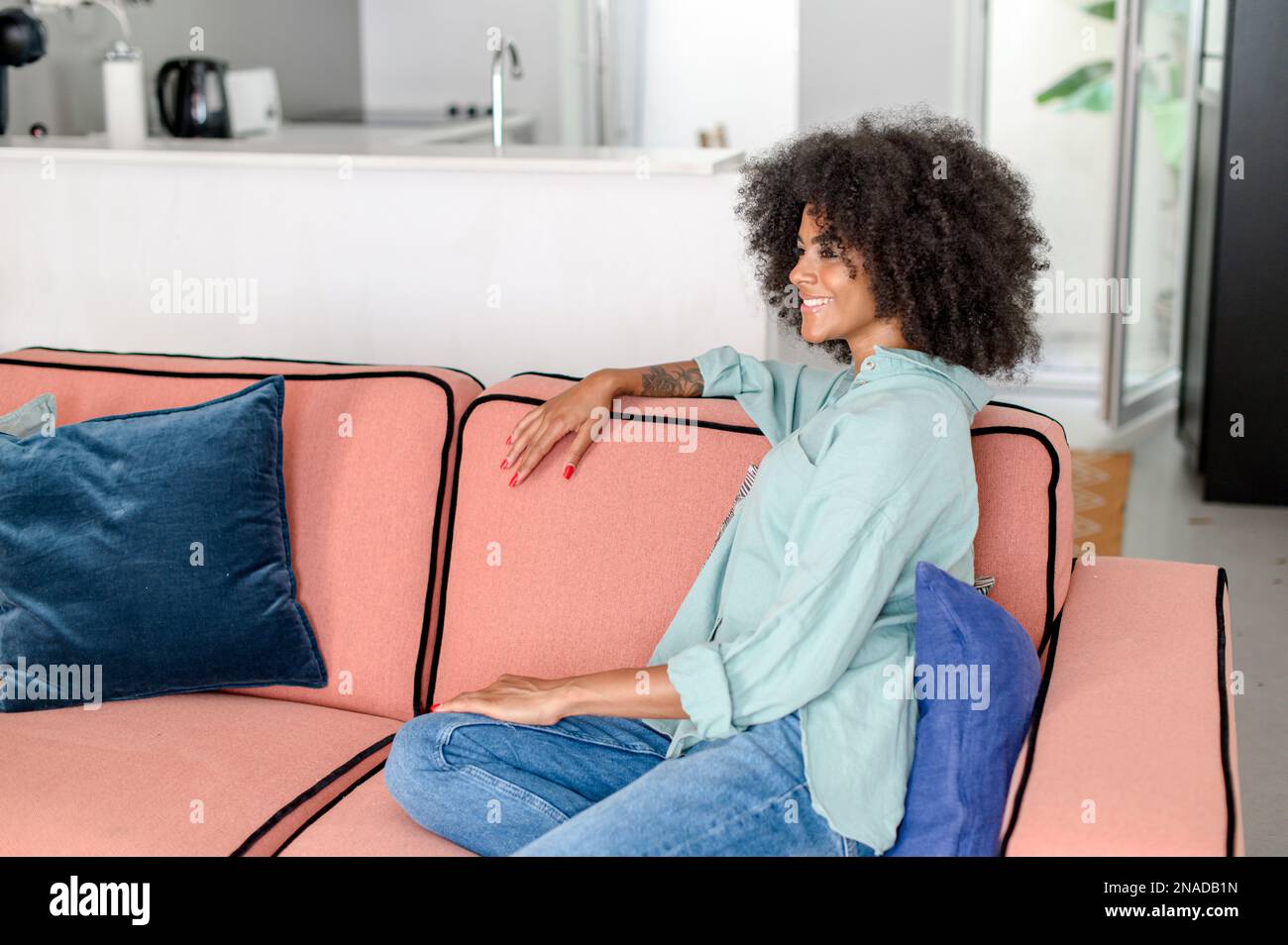 Portrait of young african-american woman with beautiful smile and ...
