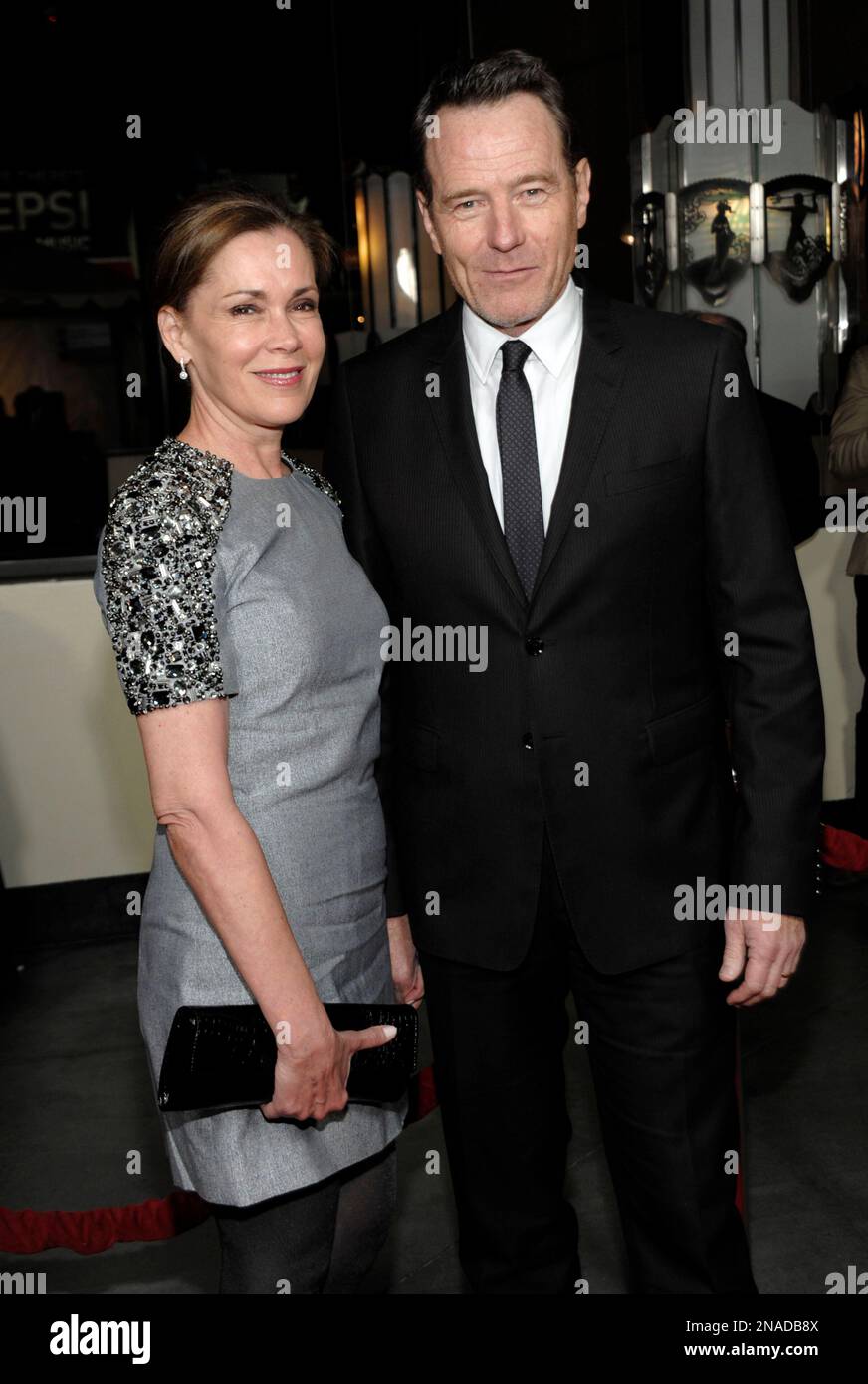 Bryan Cranston, right, and Robin Dearden arrive at the 64th Annual ...