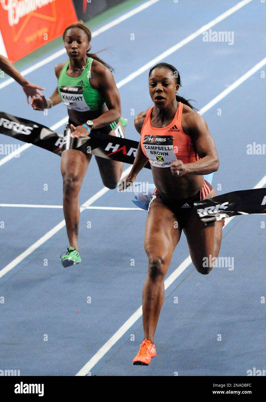 Veronica Campbell-Brown, right, of Jamaica, wins the women's 50-meter ...