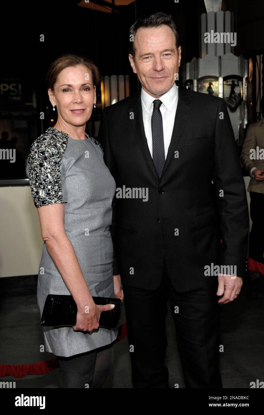 Bryan Cranston, right, and Robin Dearden arrive at the 64th Annual ...
