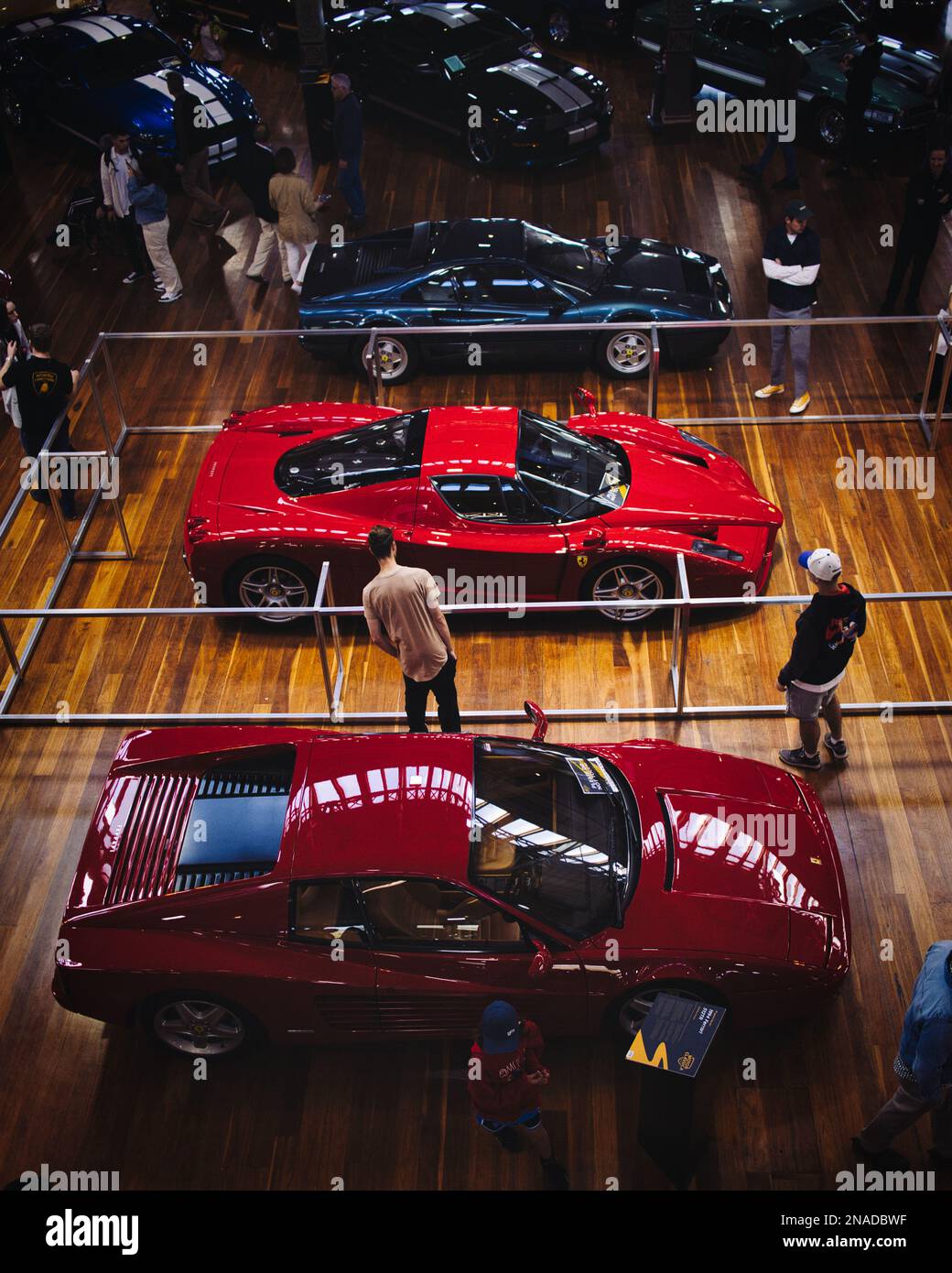 A vertical top view of people looking at Supercars in the Royal ...