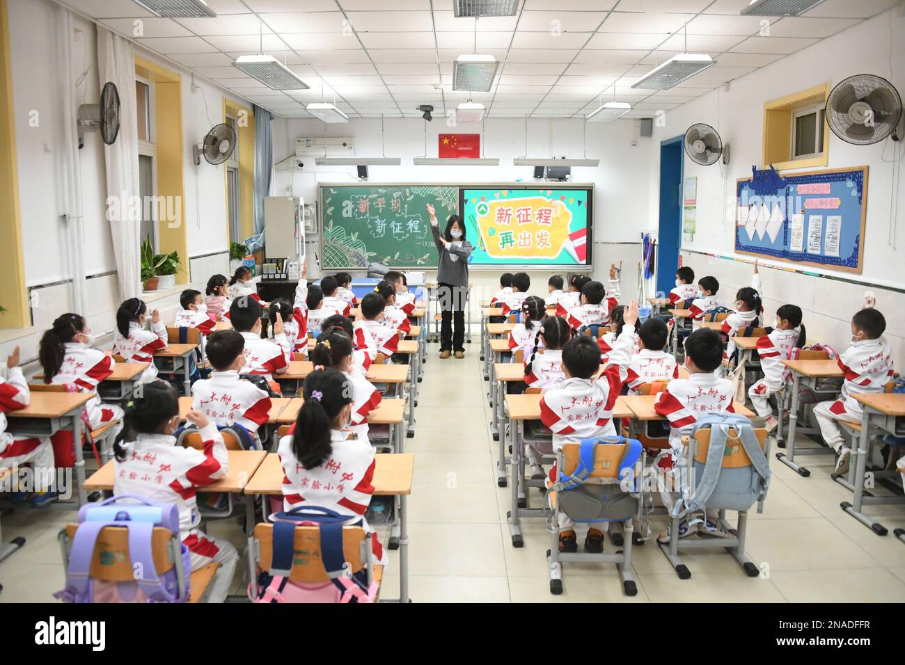 Beijing, China. 13th Feb, 2023. Pupils have class on their first day of ...