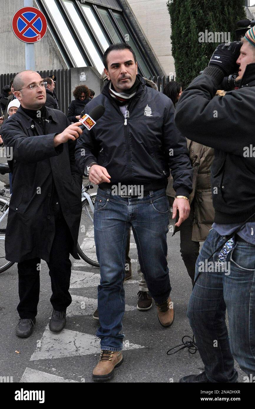 Costa Concordia cruise ship first officer Ciro Ambrosio, center, leaves ...