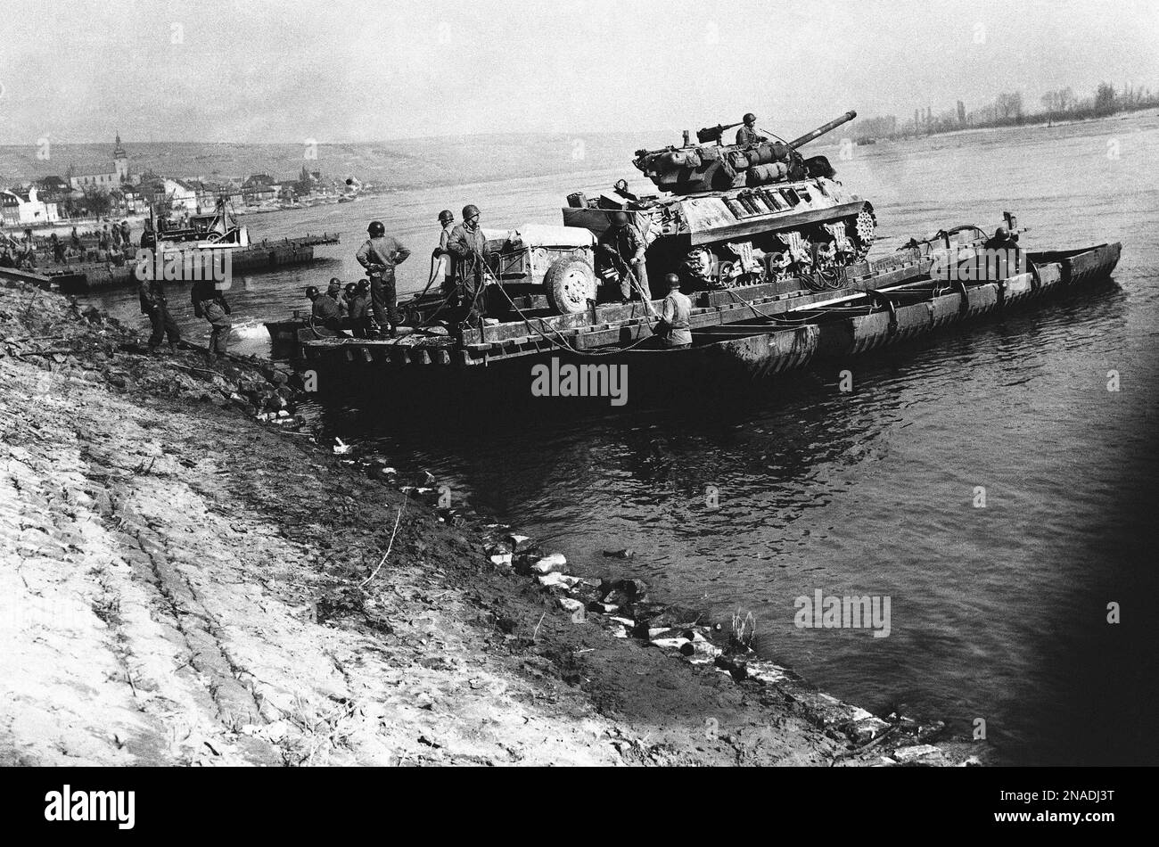 An Allied tank and other equipment is prepared for the Rhine crossing ...