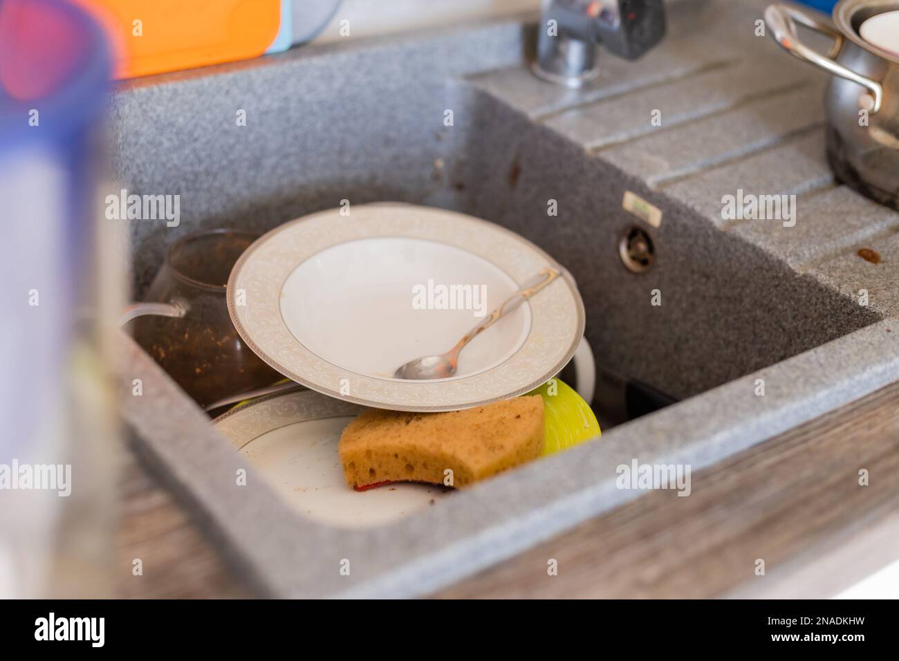 dirty dishes in the kitchen sink. A raid on plumbing. High quality ...
