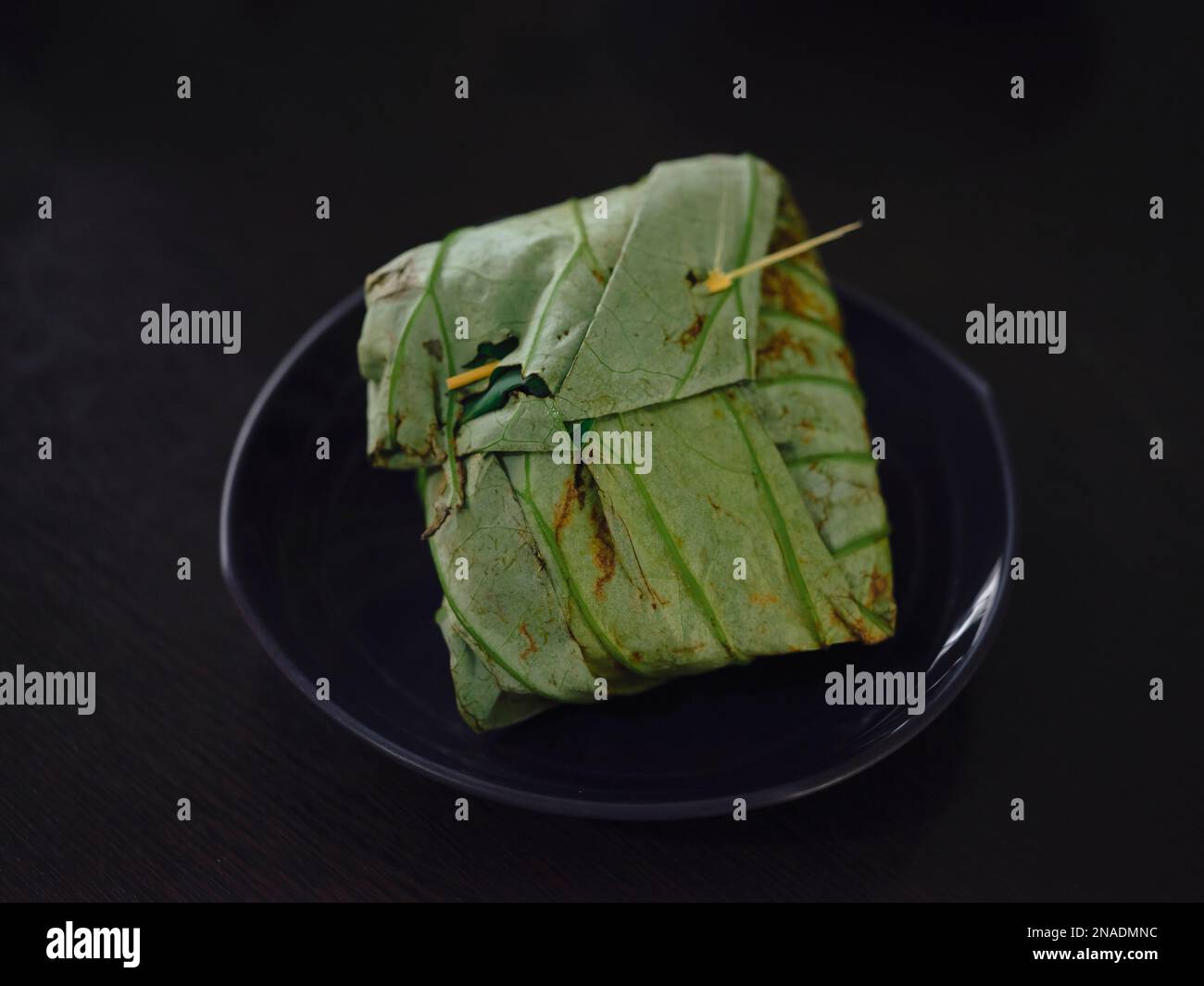 Rice Wrapped in Lotus Leaves . Thai food Stock Photo - Alamy