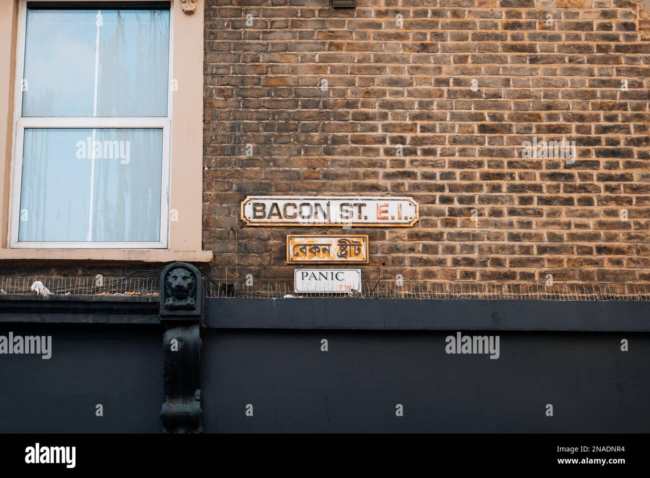 London, UK - February 09, 2023: English and Bengali bilingual street ...