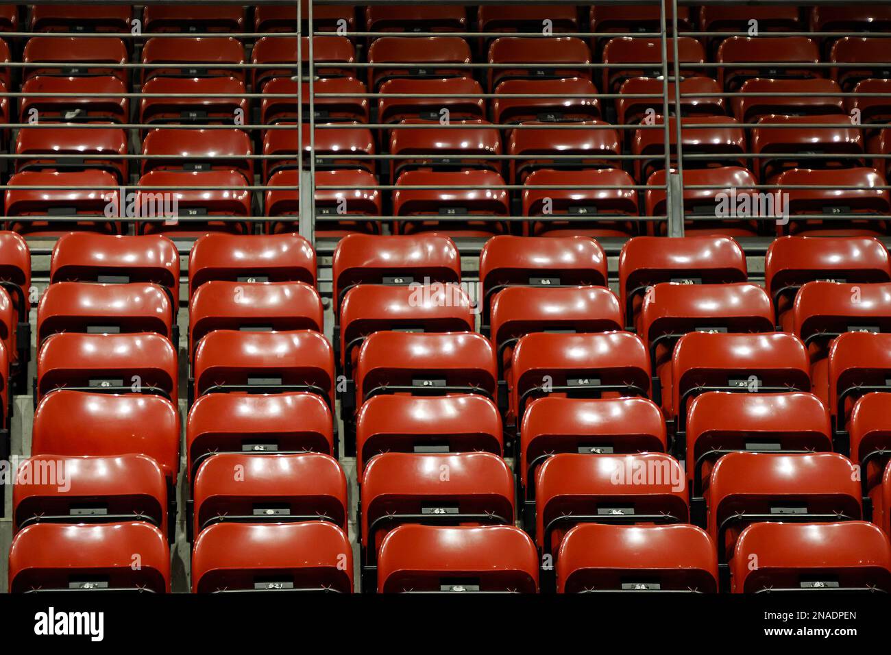Bright red stadium seats on the stand Stock Photo - Alamy