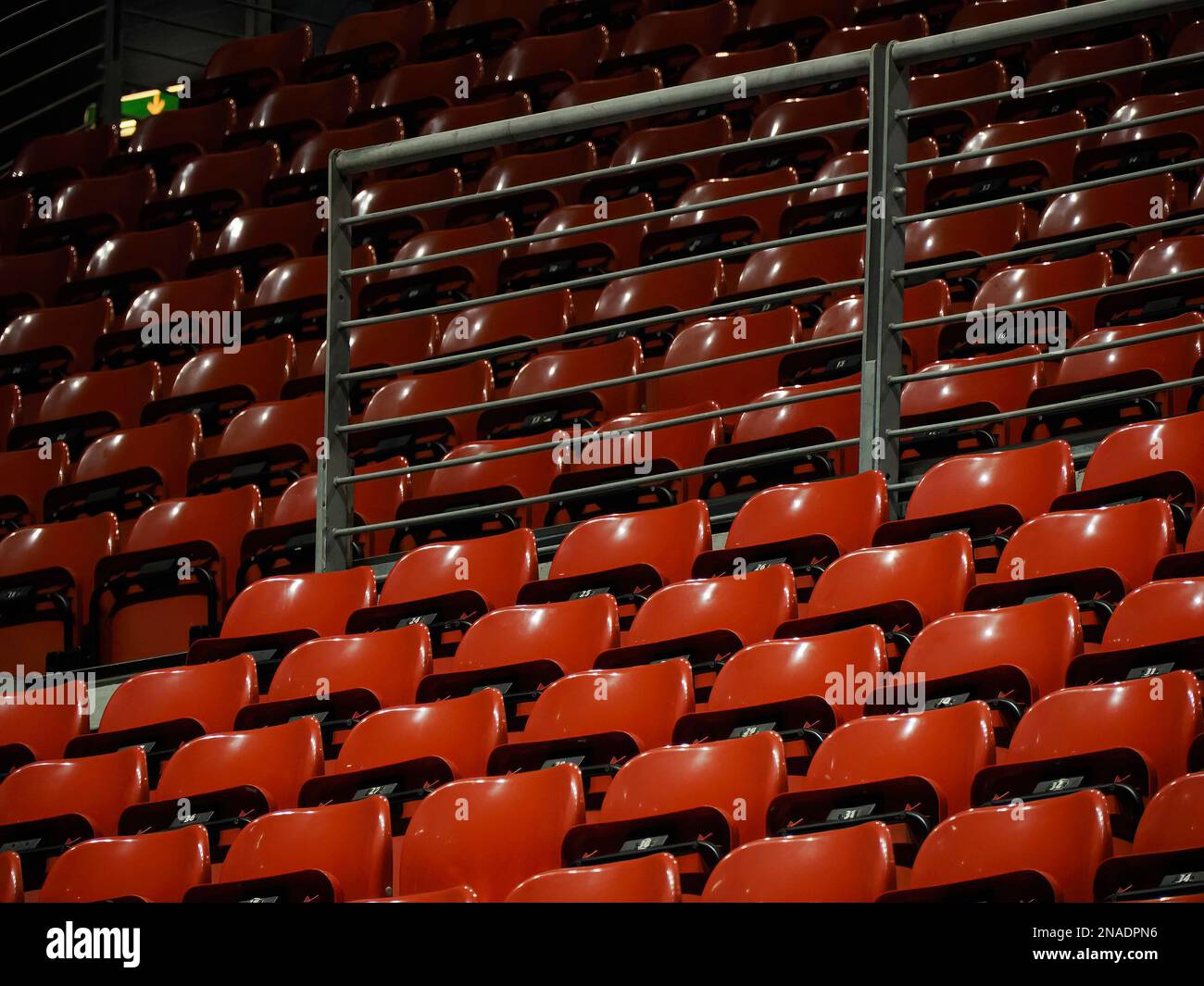 Bright red stadium seats on the stand Stock Photo - Alamy