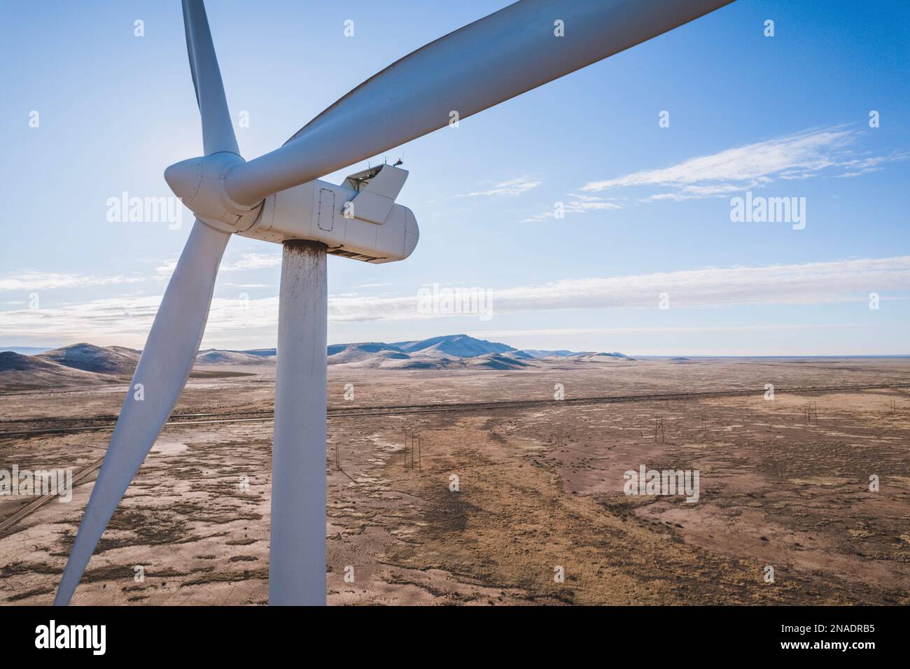 A wind turbine producing clean energy in the New Mexico desert Stock ...