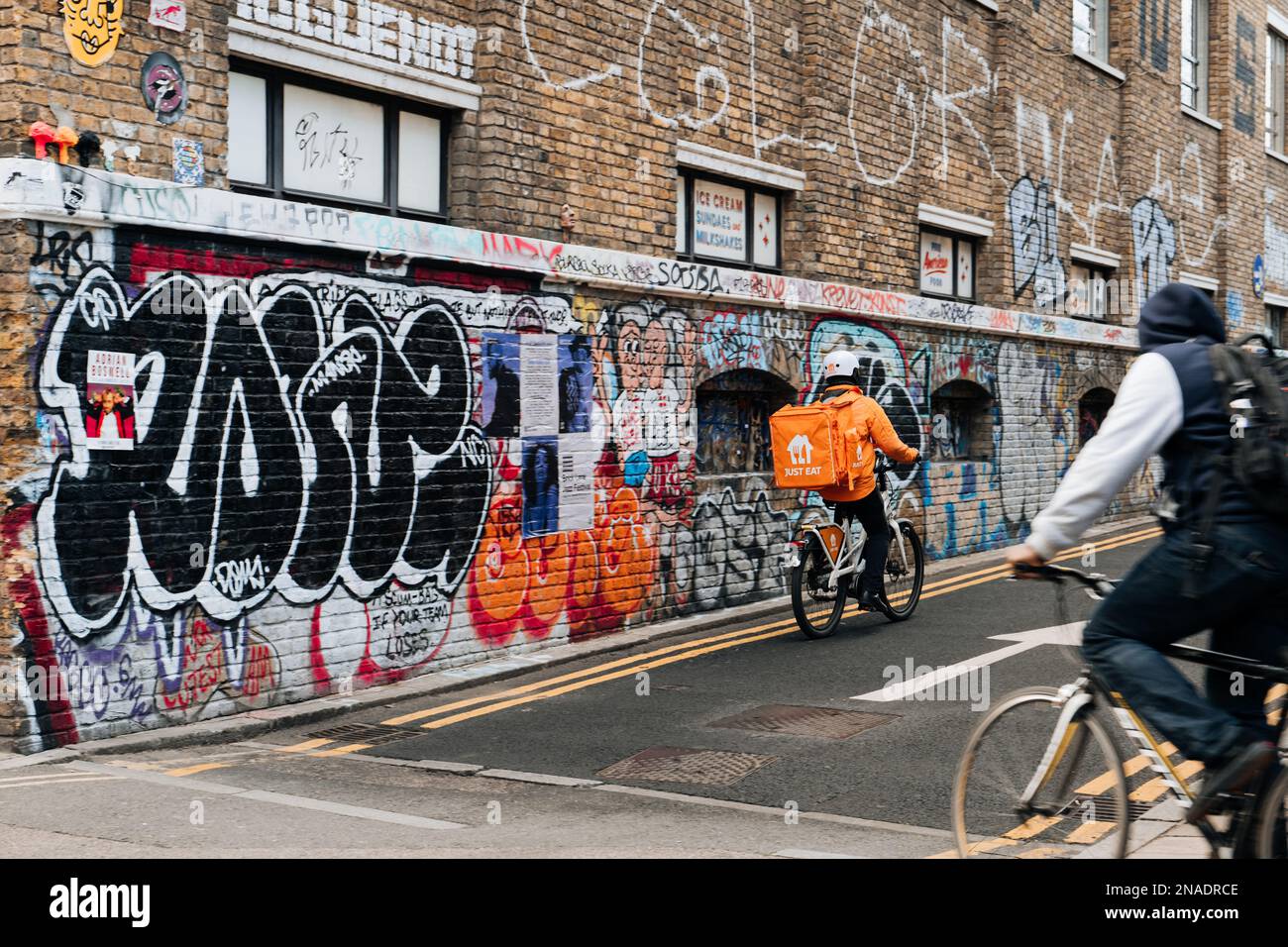 London, UK - February 09, 2023: Just Eat delivery driver on a street in ...