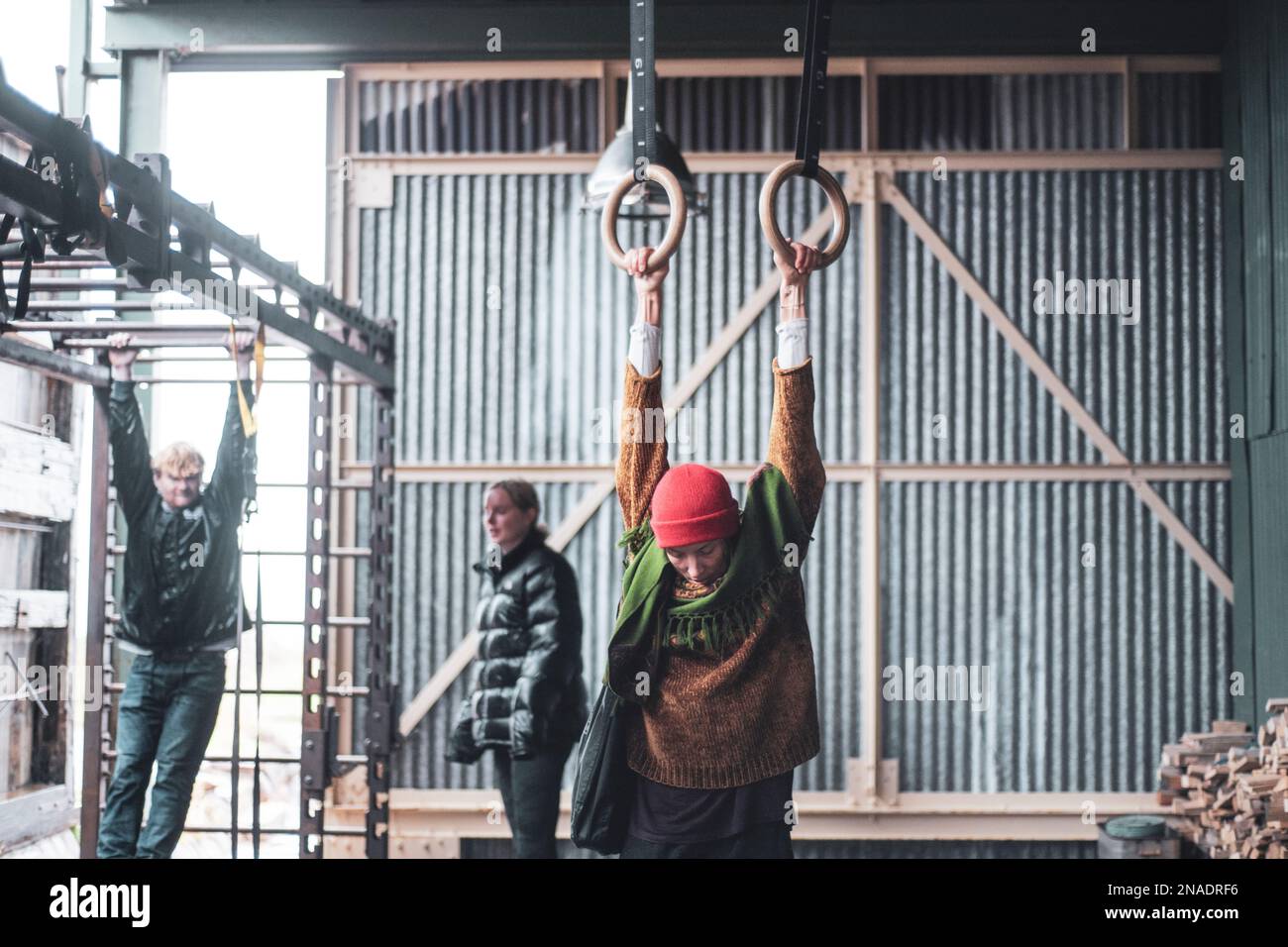 people hang off bars in outdoor shed gym in remote scotland Stock Photo ...
