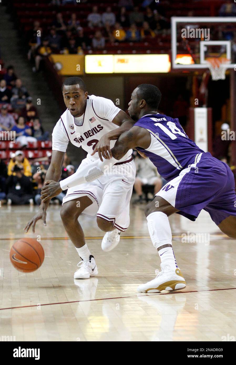Arizona State guard Chris Colvin, left, is fouled by Washington guard ...