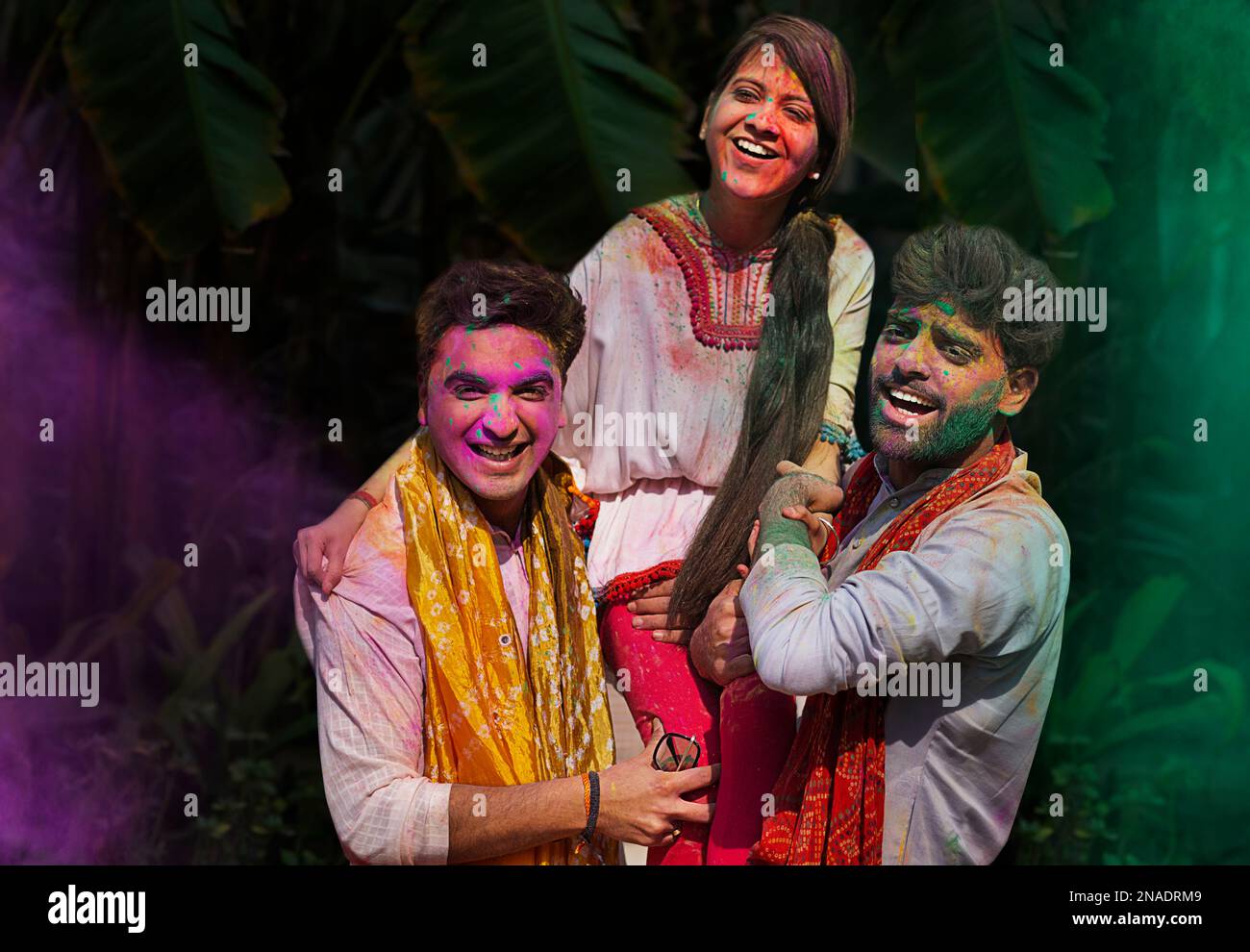 Group celebrating holi festival in hi-res stock photography and images ...