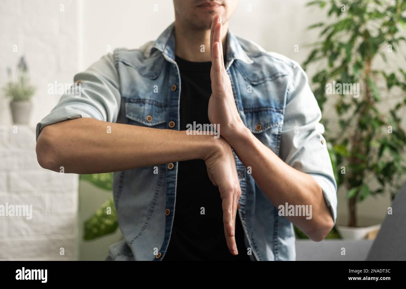 Man showing gesture in sign language on white background Stock Photo ...