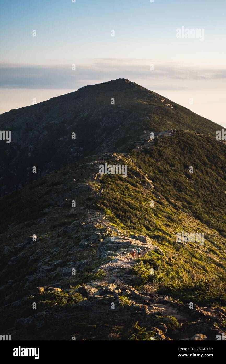 Trail runners on the Franconia Ridge at sunrise Stock Photo - Alamy