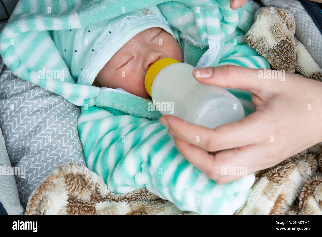 Baby boy sleeping with a pacifier Stock Photo - Alamy