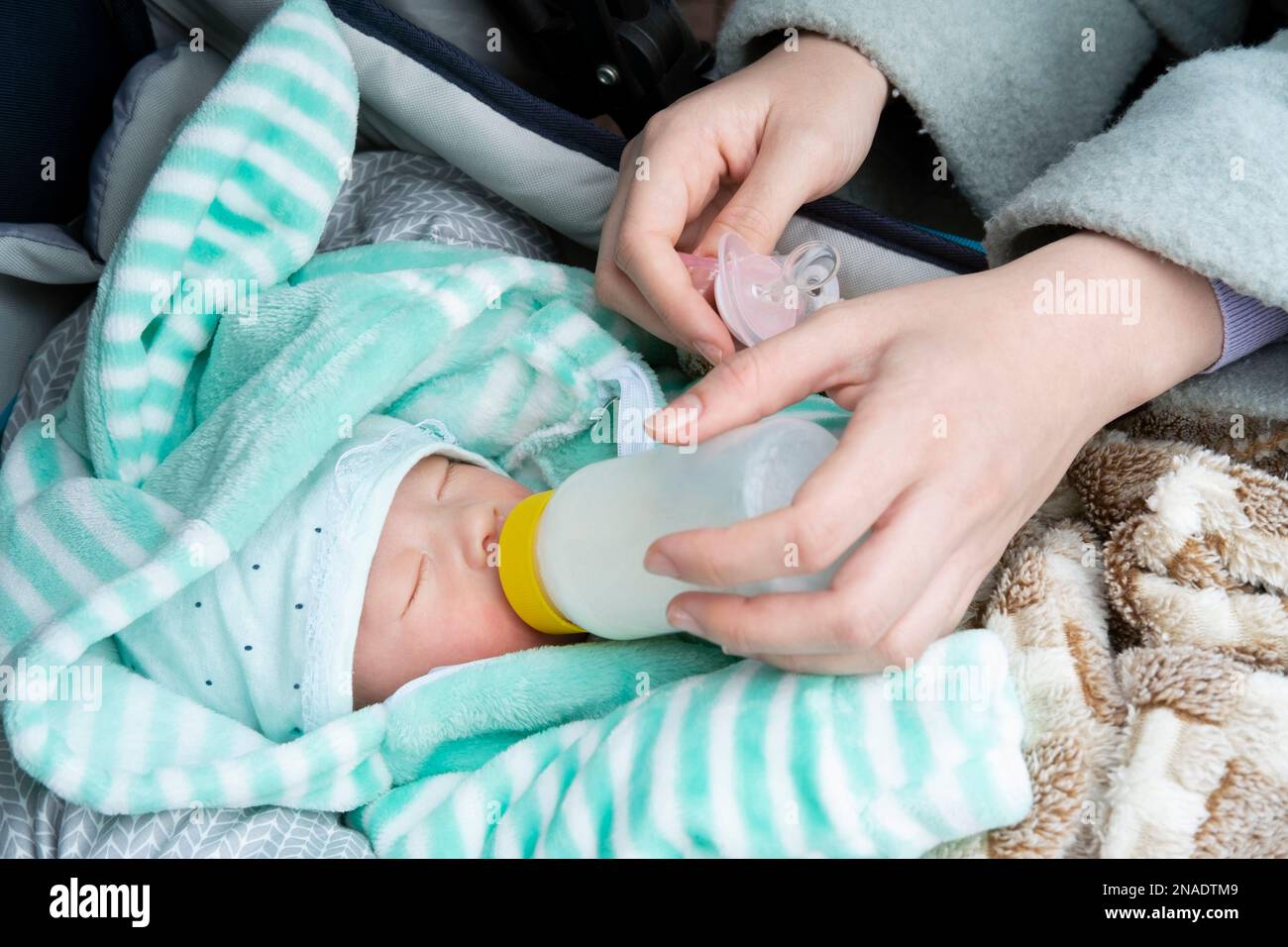 Baby boy sleeping with a pacifier Stock Photo - Alamy