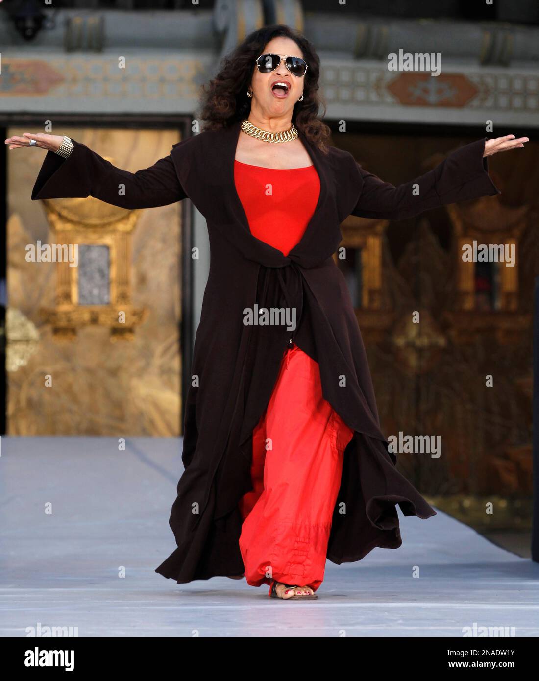 Choreographer Debbie Allen walks onstage during the hand and footprint ...