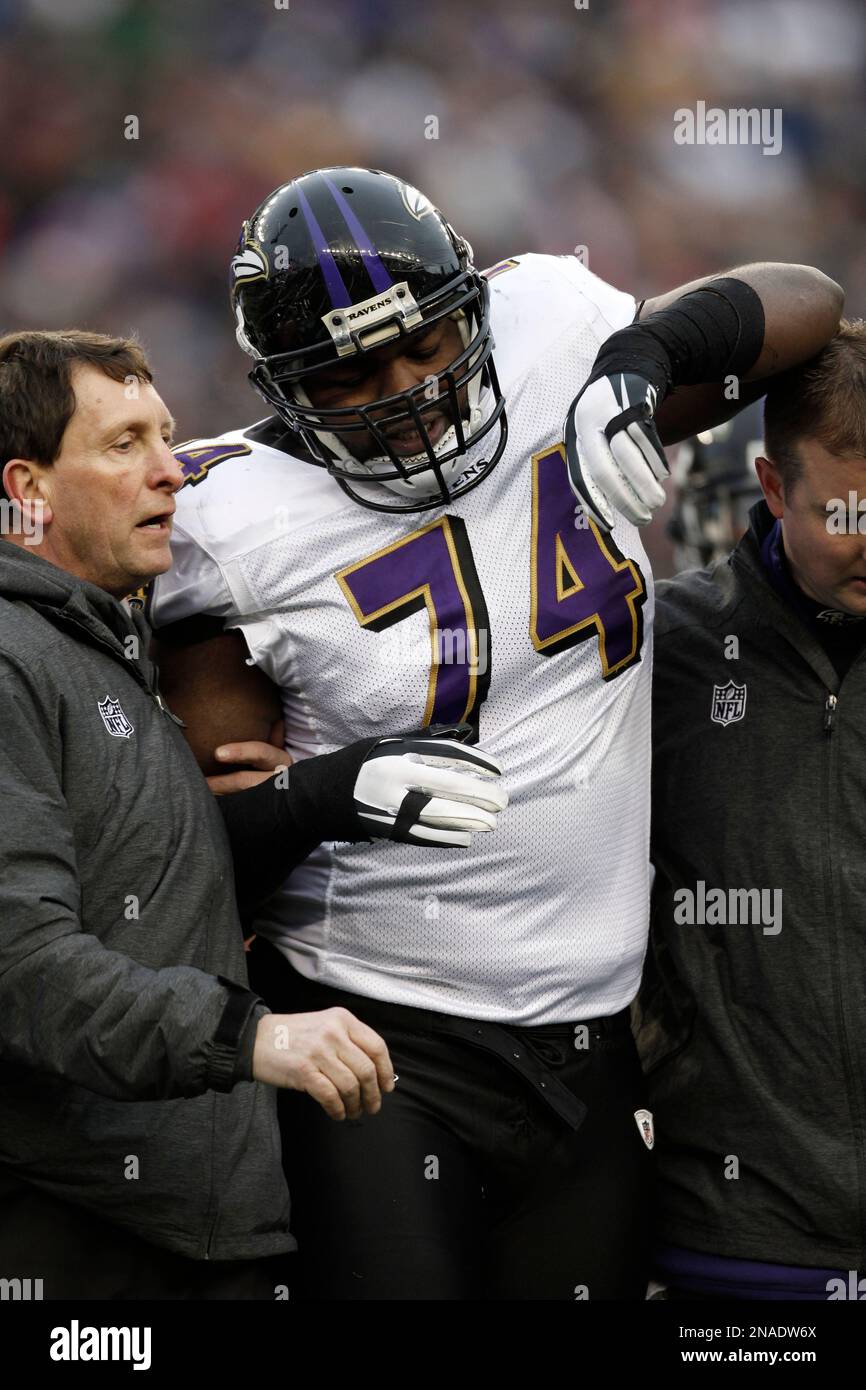Baltimore Ravens Michael Oher is taken off the field during the first ...