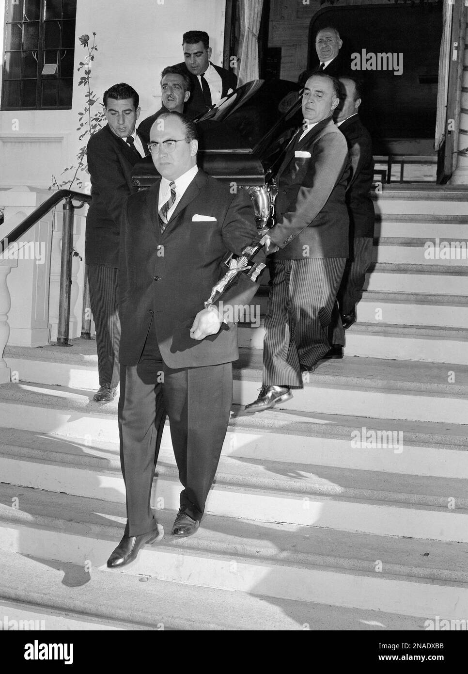 The plain mahogany-colored casket of Albert Anastasia, gangland's slain ...