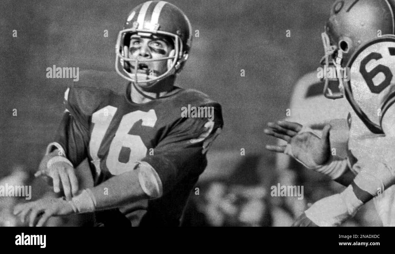 Indiana's quarterback Harry Gonso watches a pass after releasing it in ...