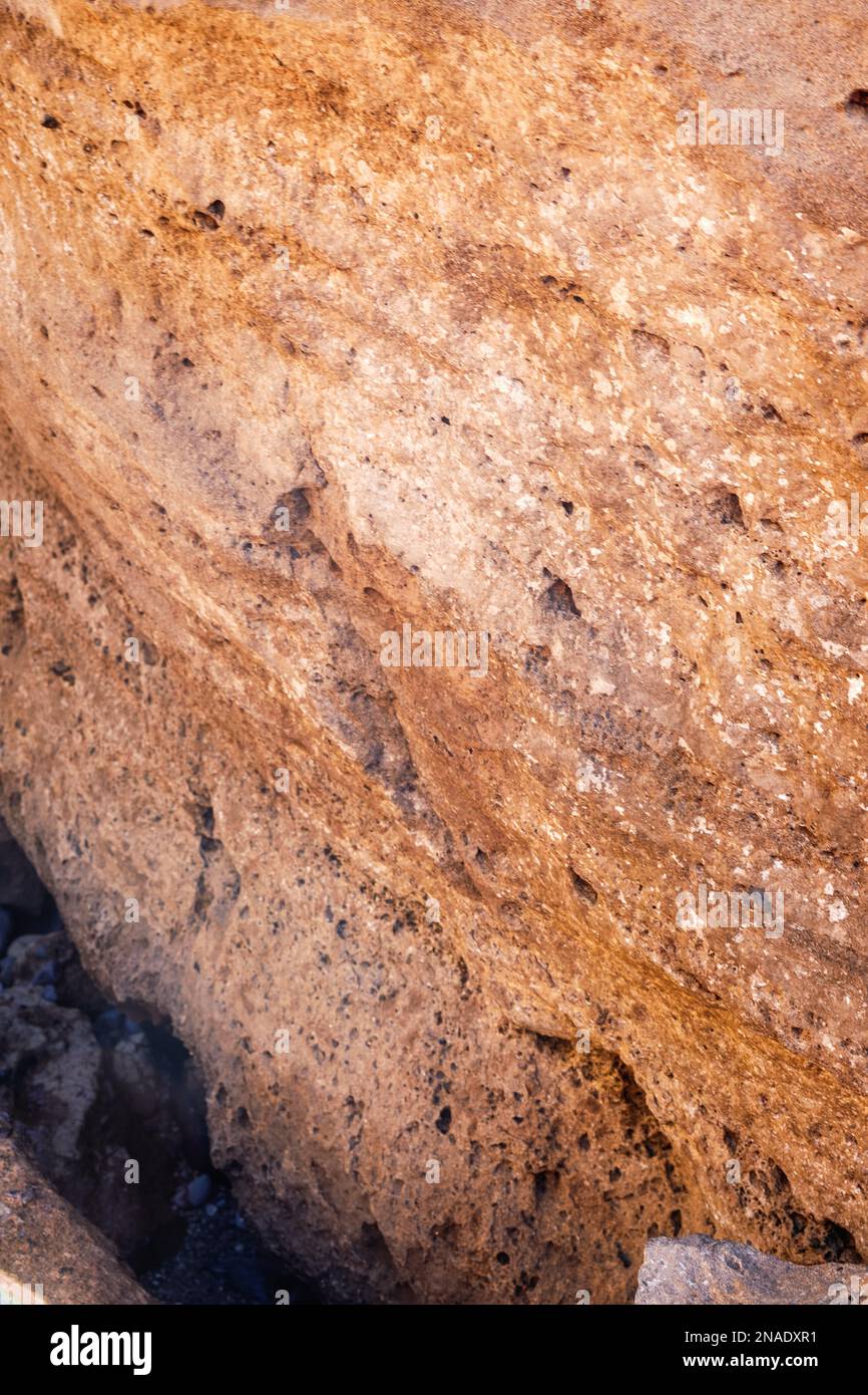 Landscape of sand and volcanic mountains with caves in the canary ...