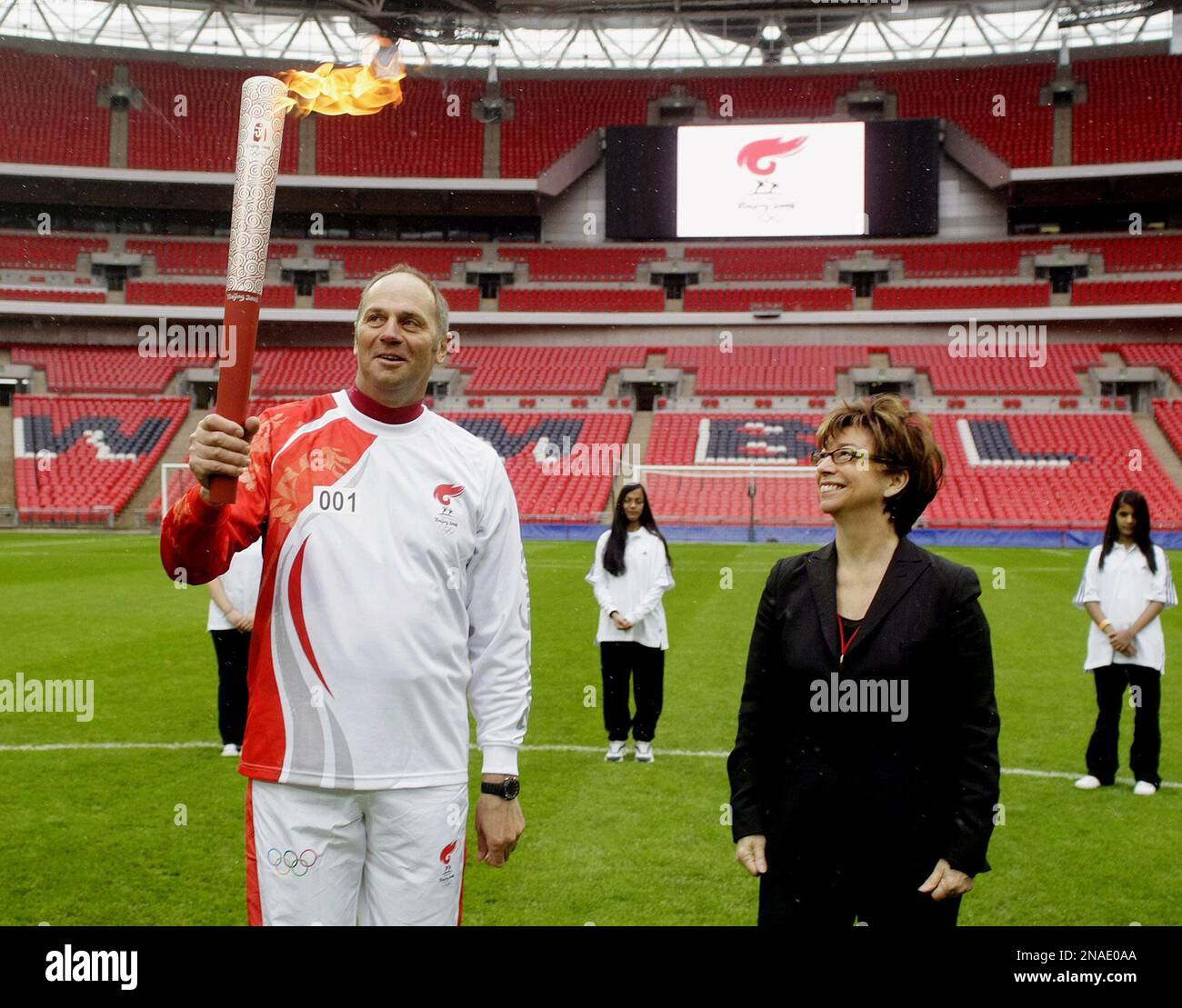 Sir Steve Redgrave is handed the Olympic torch by Deputy Mayor of ...