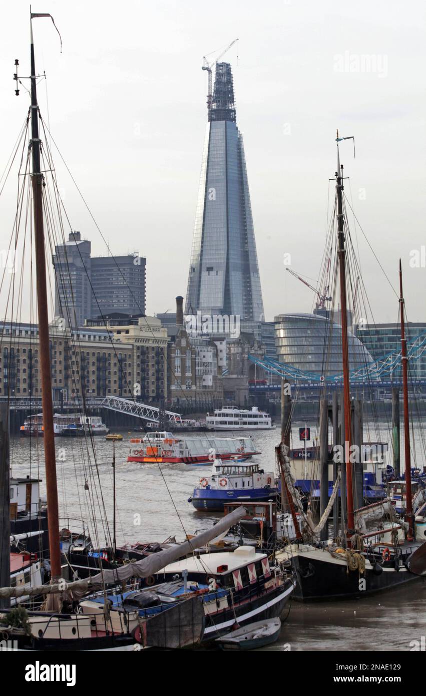 A view of The Shard, left, a newly-constructed high-rise building in ...