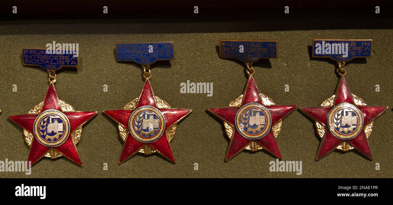 In this photo taken Wednesday, Jan. 25, 2012, medals from consecutive ...