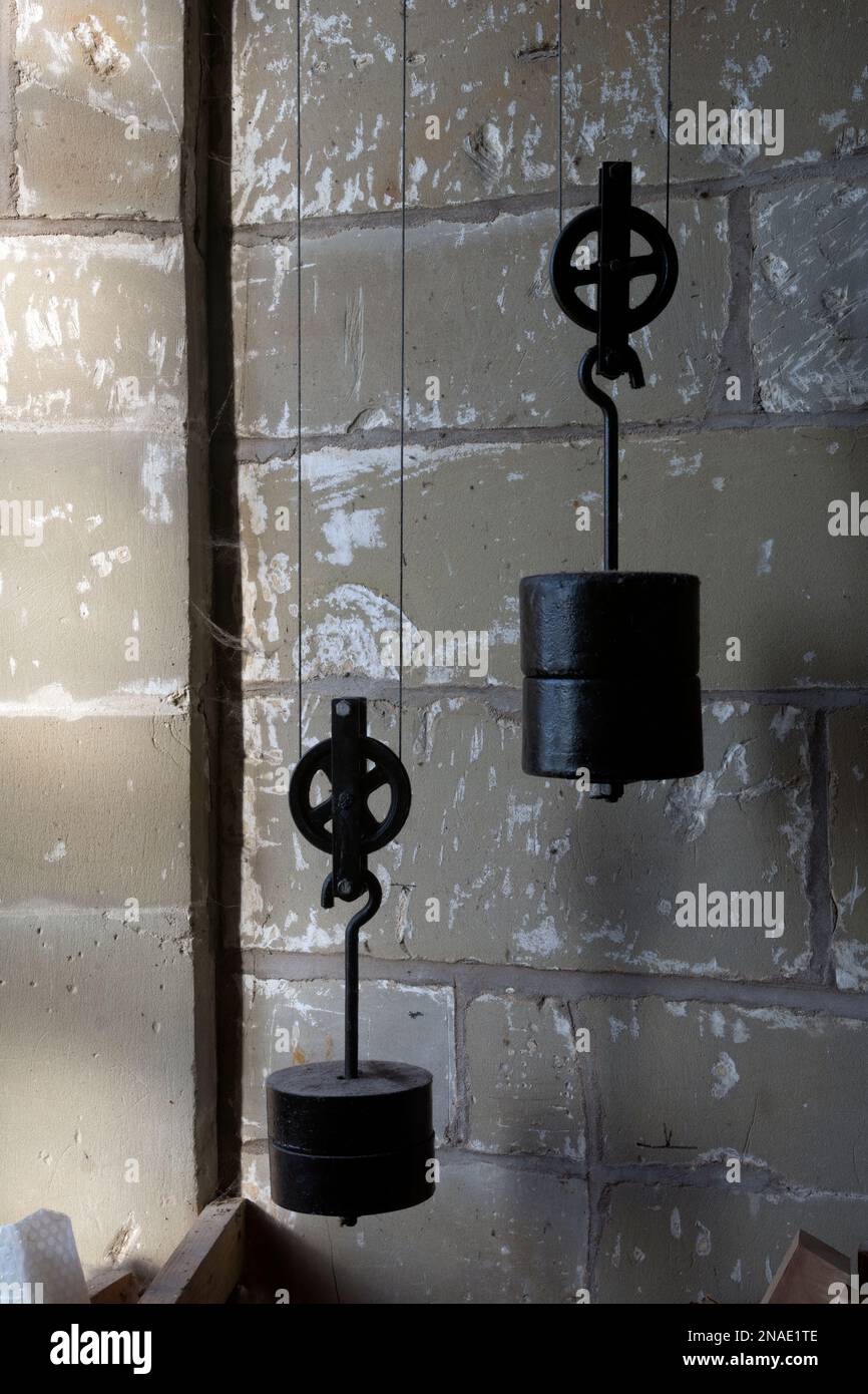 Clock weights in St. Leonard`s Church, Ryton-on-Dunsmore, Warwickshire ...
