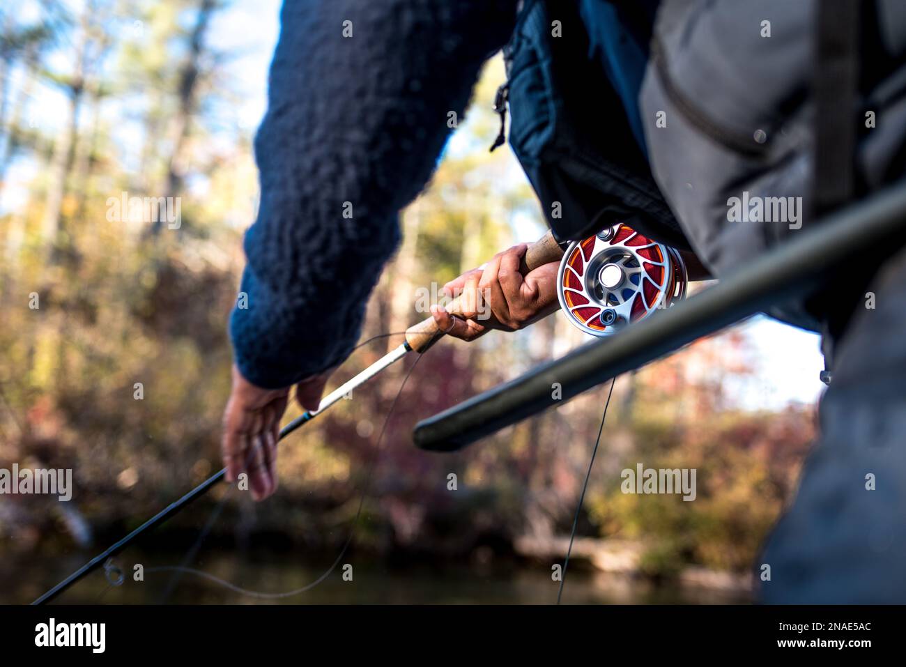 Man using fishing rod hi-res stock photography and images - Alamy