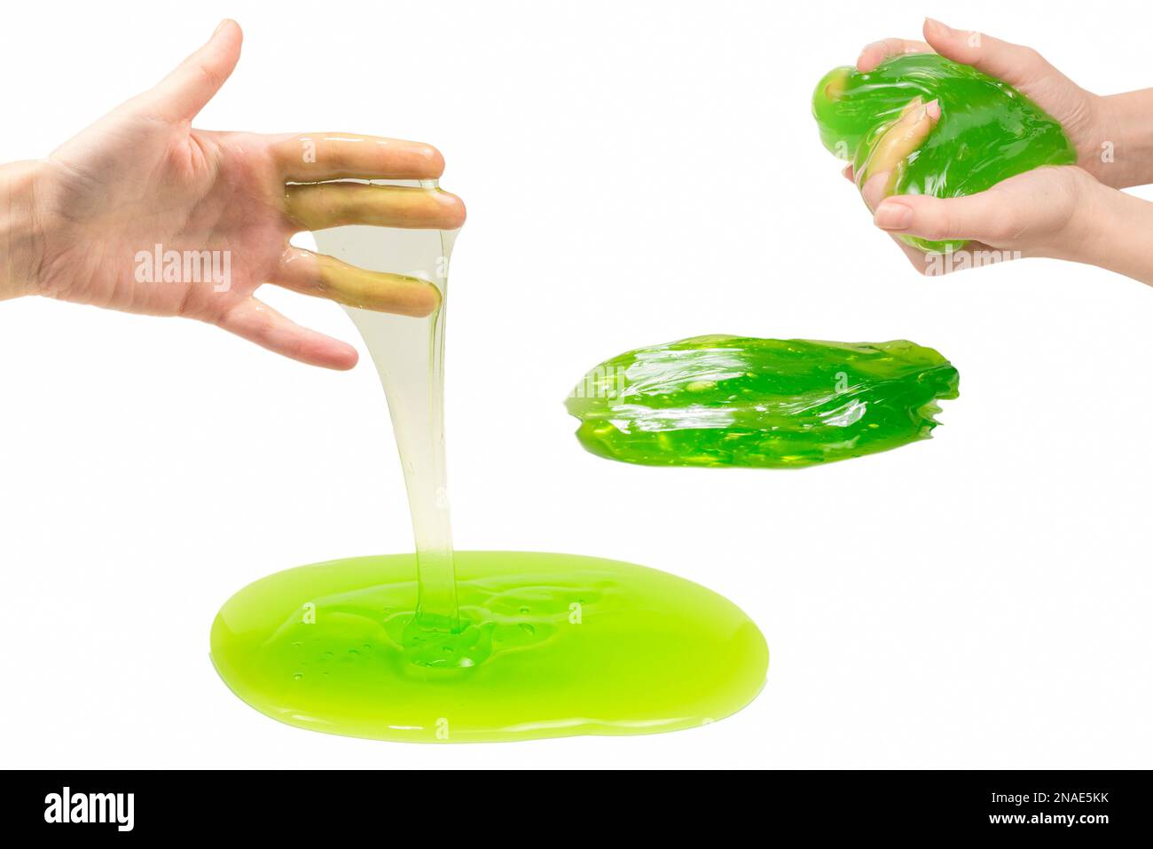 Green slime toy in woman hand isolated on white Stock Photo - Alamy