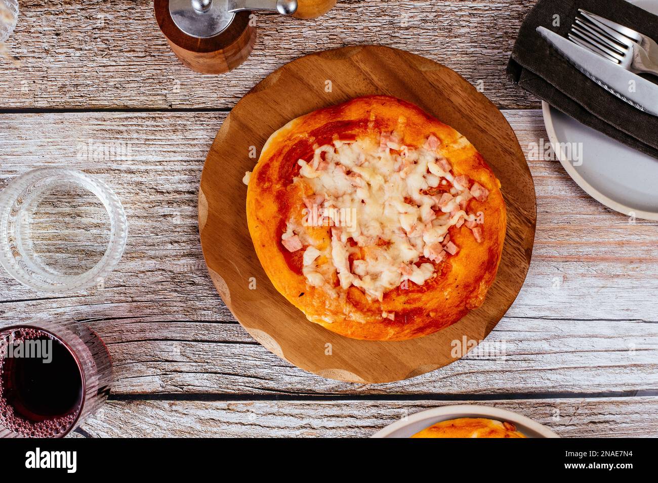 homemade pizza with ham and cheese Stock Photo - Alamy