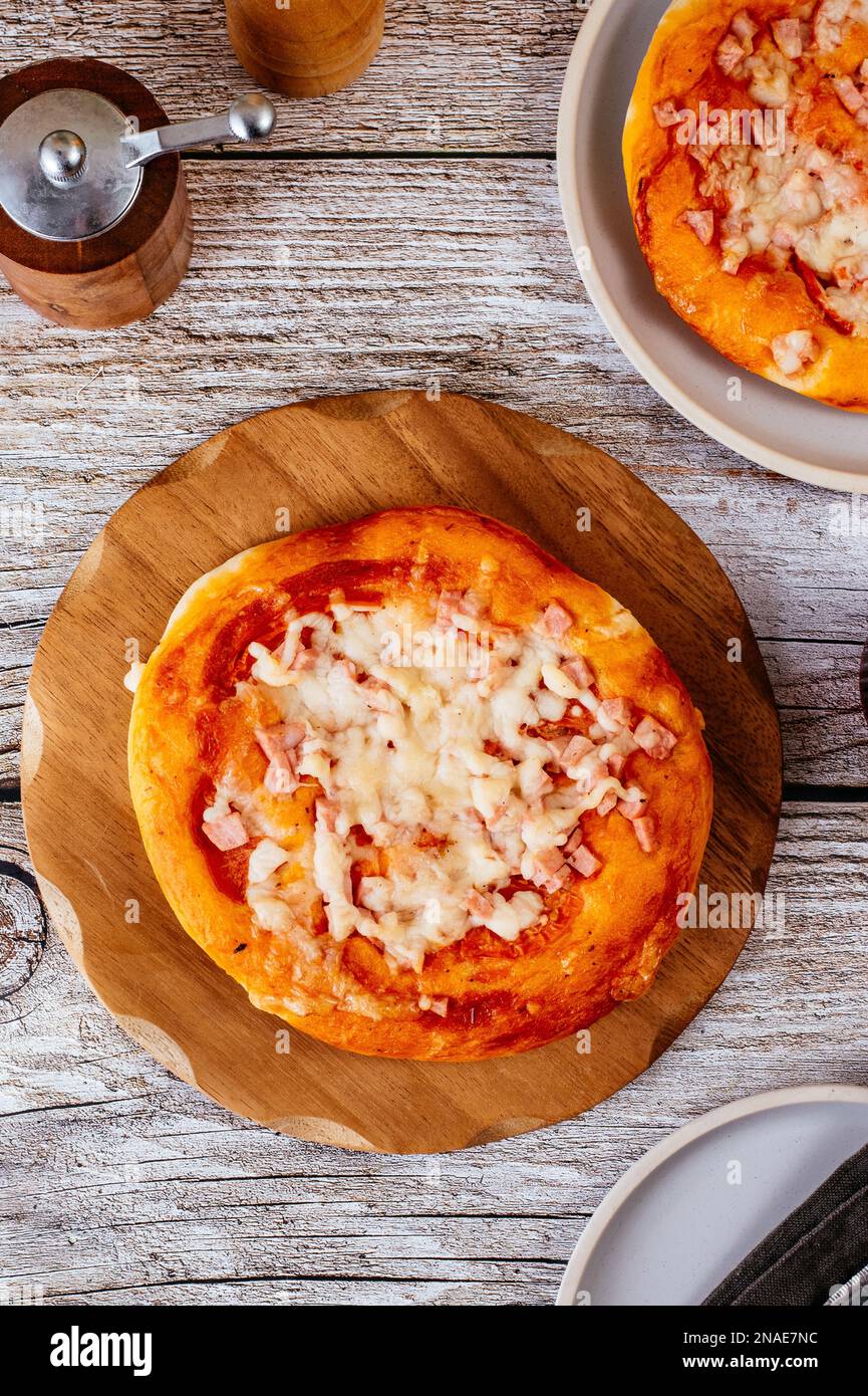 homemade pizza with ham and cheese Stock Photo - Alamy