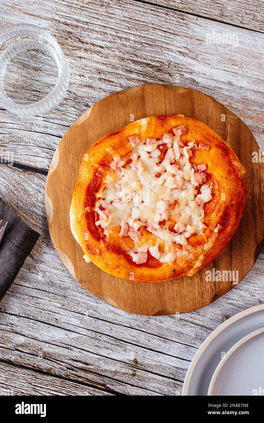 homemade pizza with ham and cheese Stock Photo - Alamy