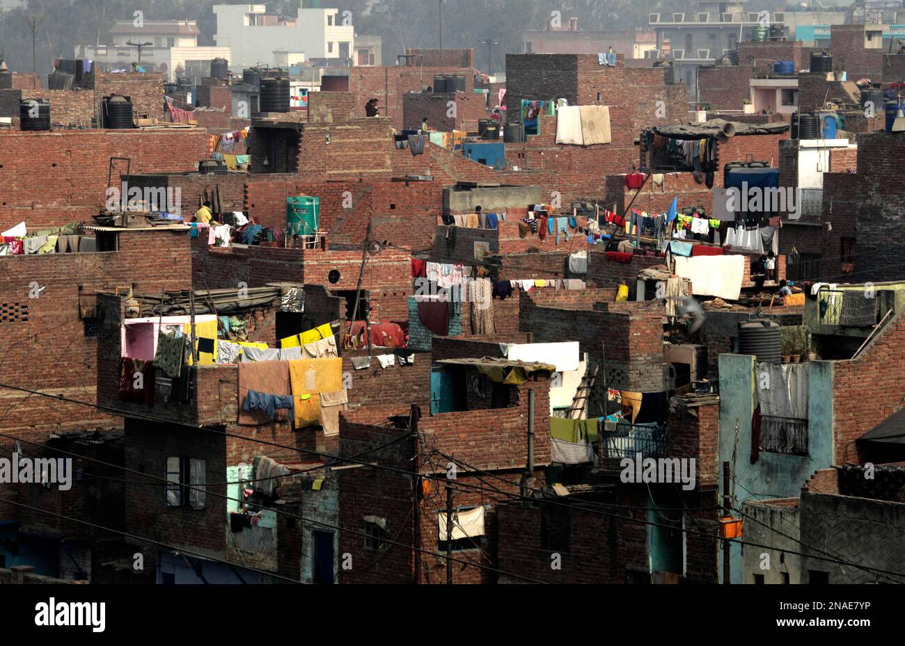 This Dec. 20, 2011 photo shows congested houses built close to each ...