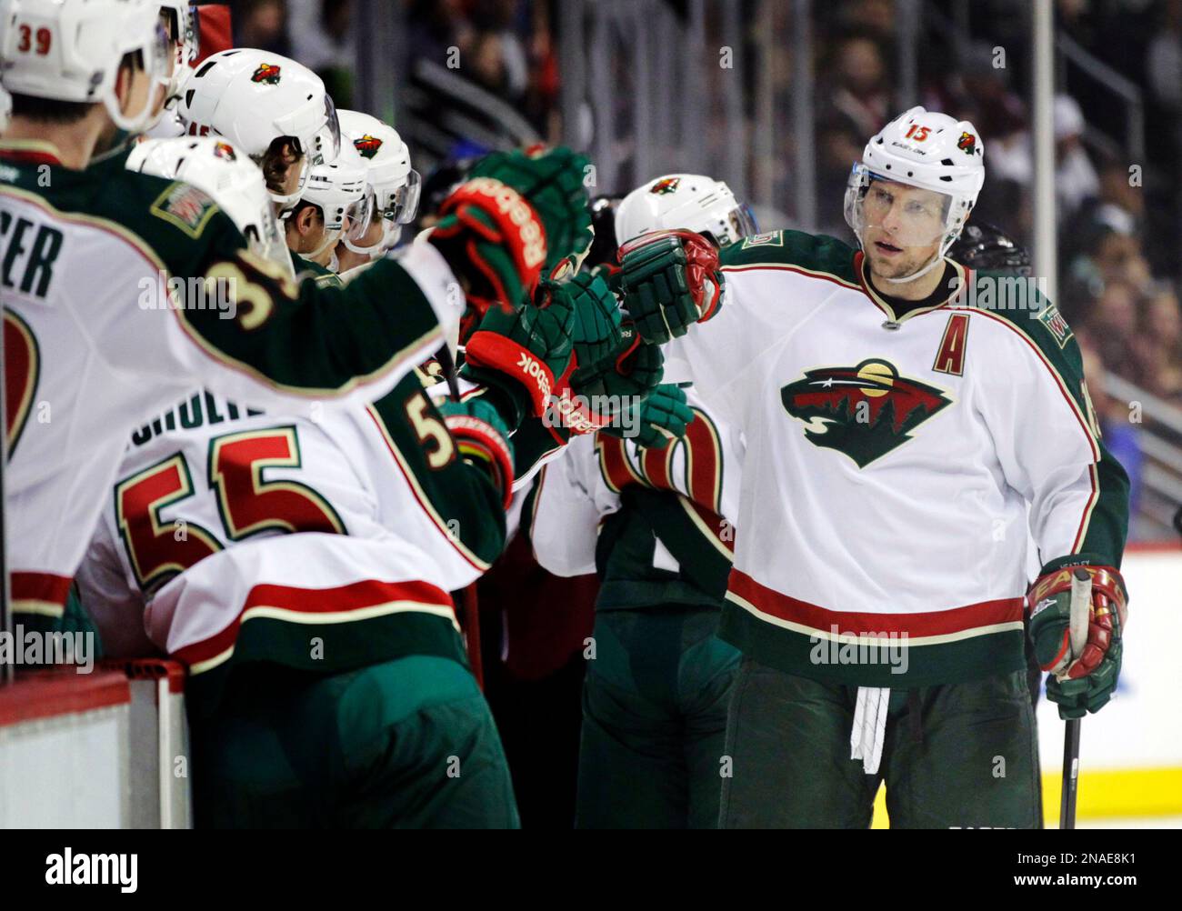 Minnesota Wild players congratulate left wing Dany Heatley, right ...