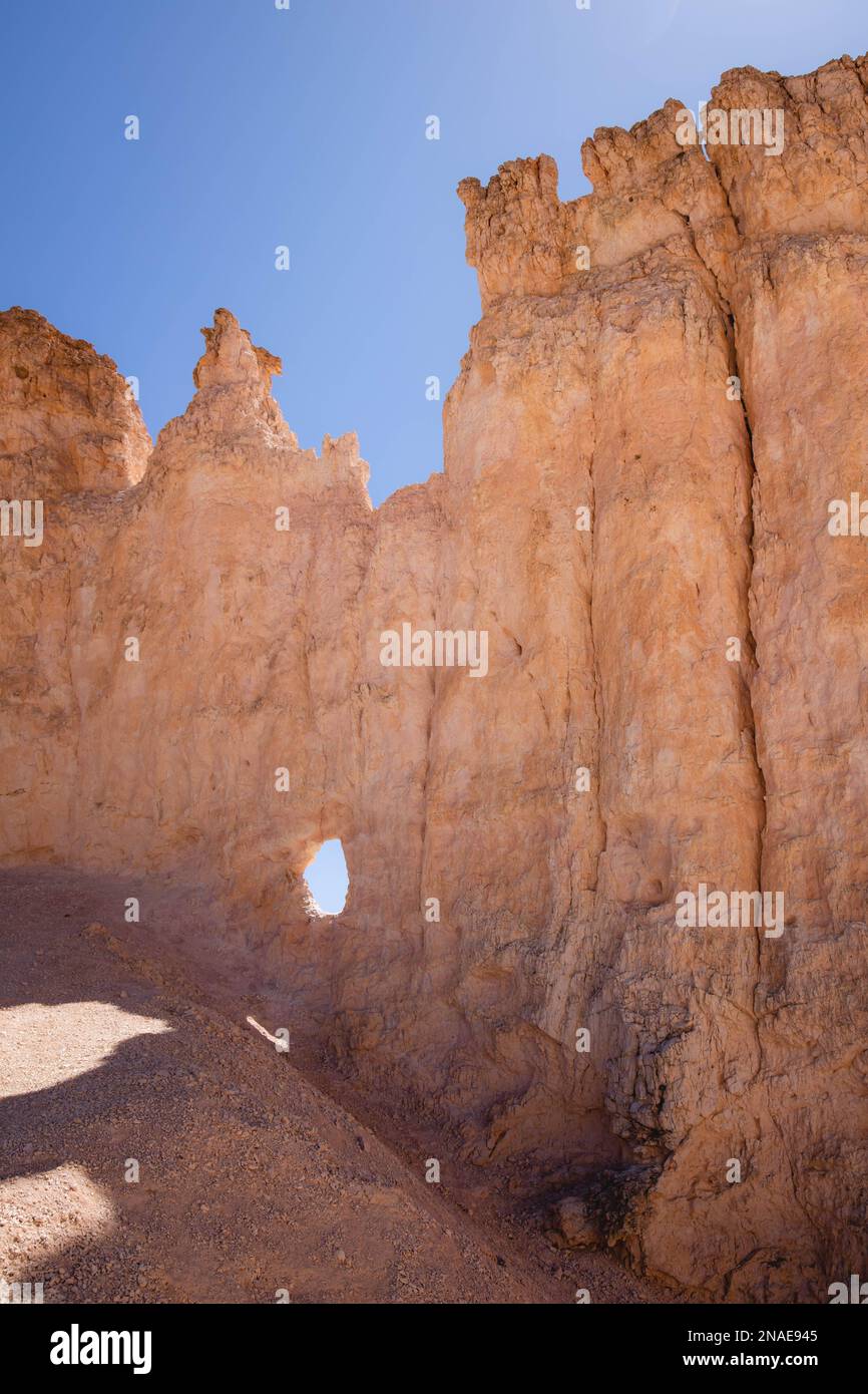 Bryce Canyon limestone rock formation with window and blue sky Stock ...