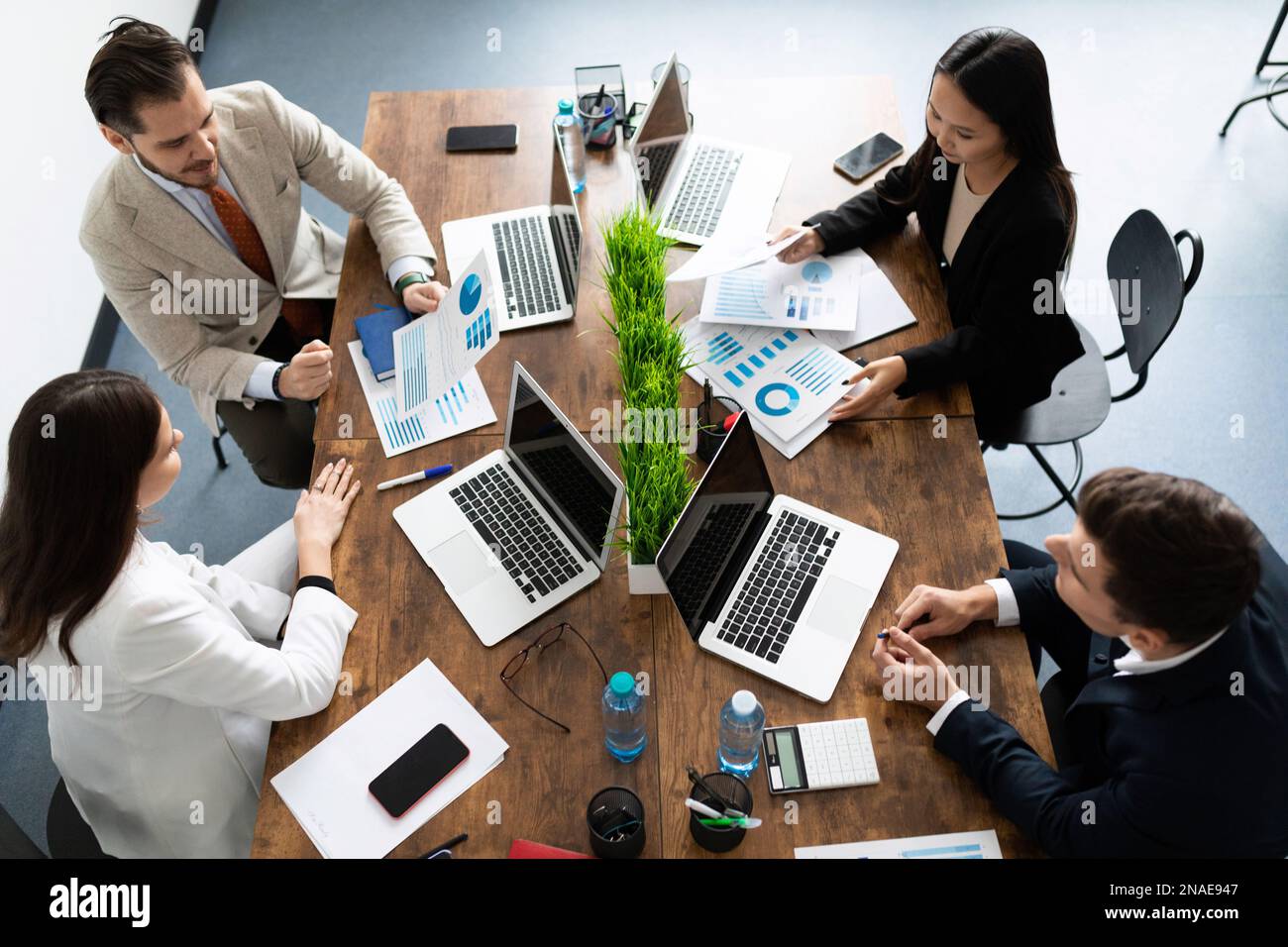 Mature man sitting round table hi-res stock photography and images - Alamy