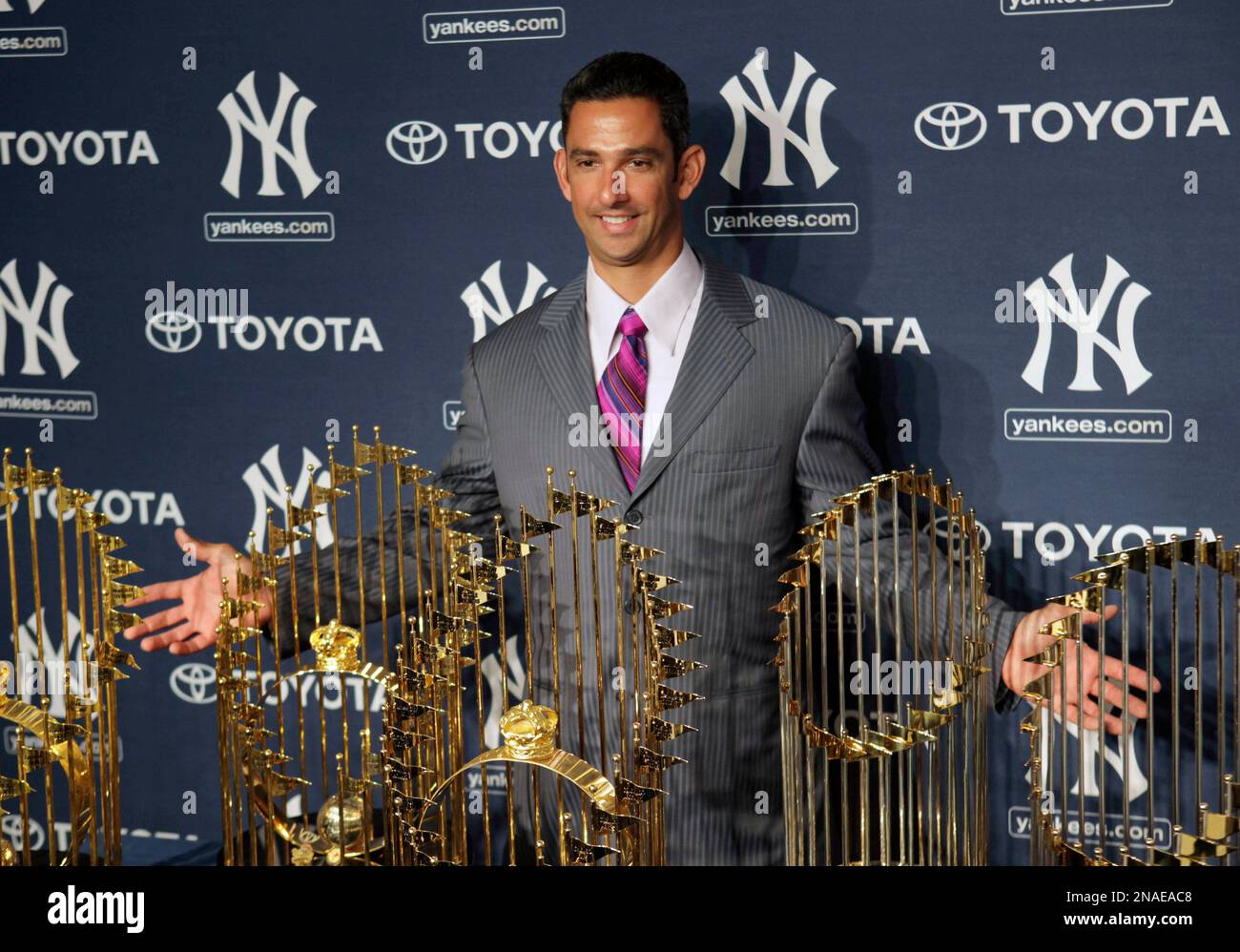 New York Yankees' Jorge Posada poses for a picture while standing ...