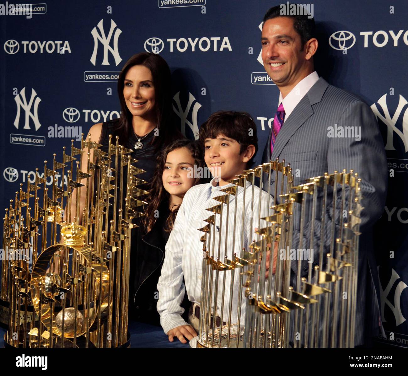 New York Yankees' Jorge Posada, right, poses for a picture with five ...