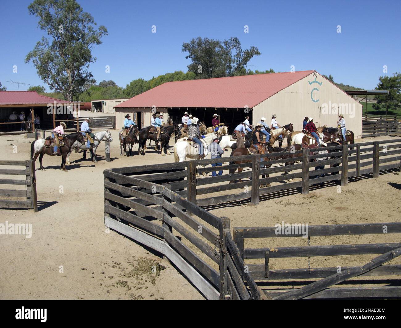 In this April 20, 2009 photo, guests prepare to ride horses at Rancho ...