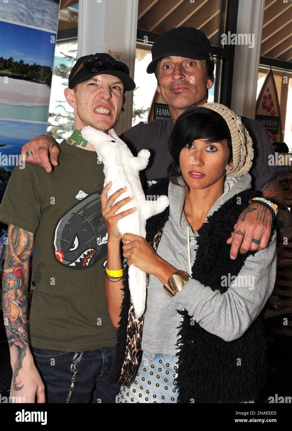 From left, DJ deadmau5, Tommy Lee and Sofia Toufa are seen at the Fender Music Lodge during the ...